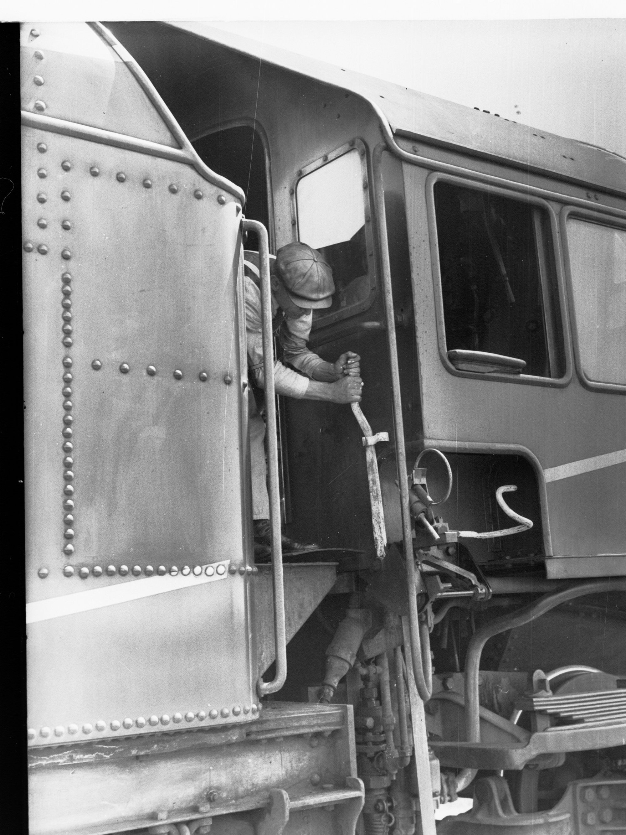 Man Working on Locomotive at Virginia | History Trust