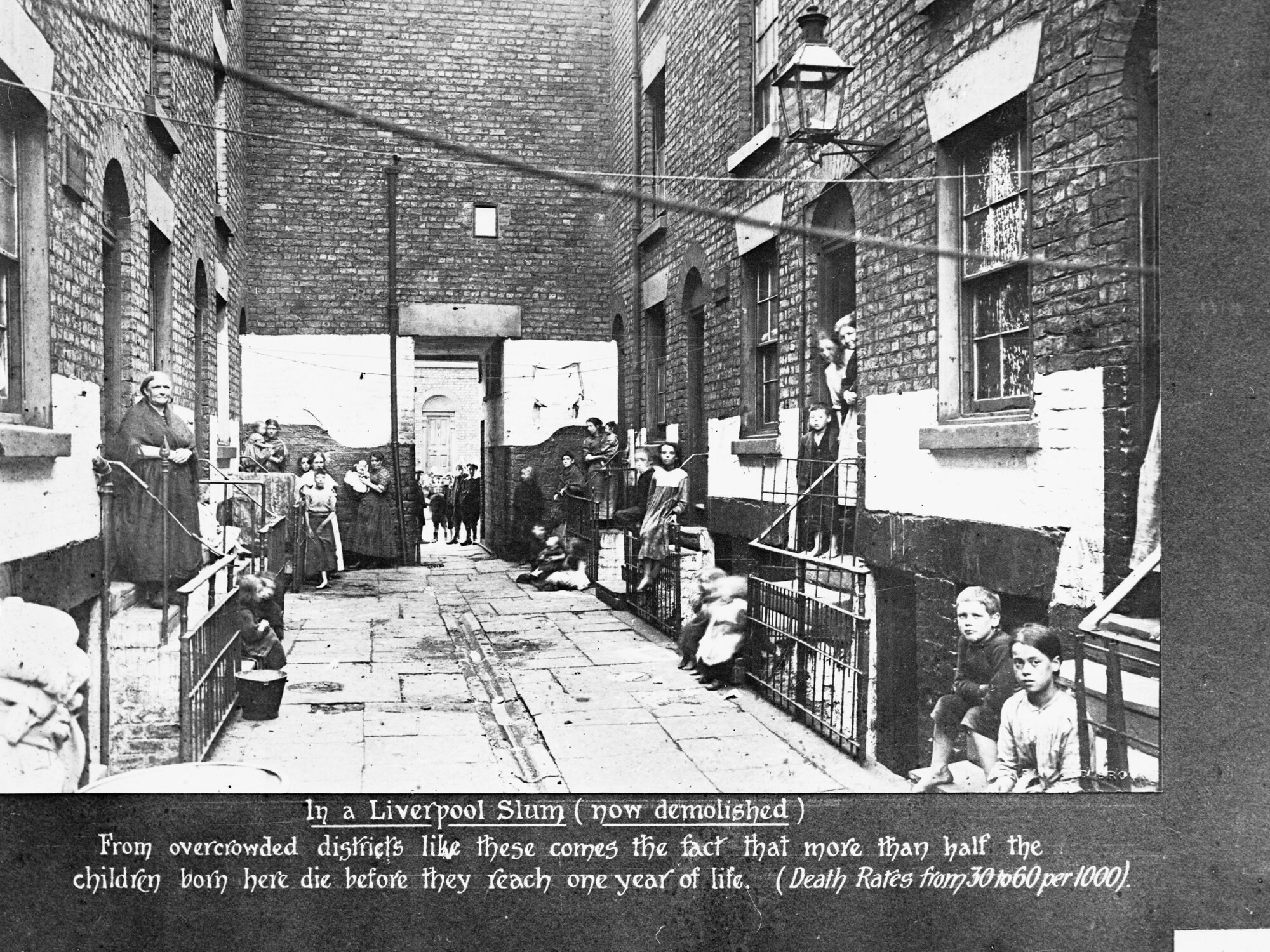 Photo titled "In a Liverpool Slum" (Town Planner's photograph ...